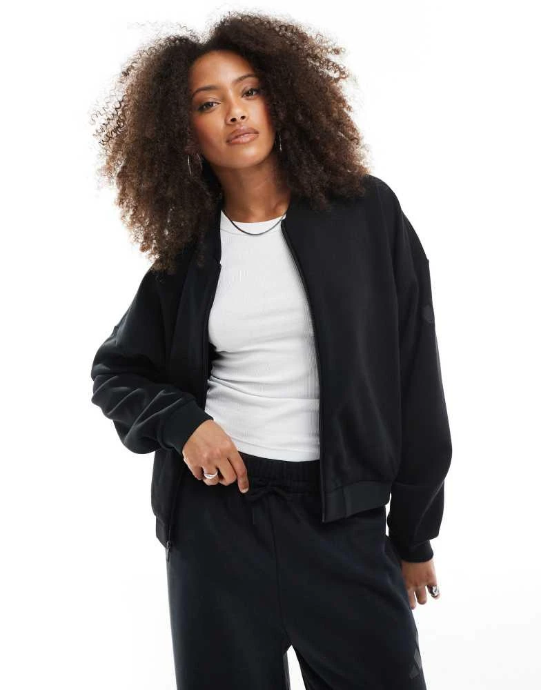 Adidas adidas Essentials contemporary logo bomber jacket in black ...