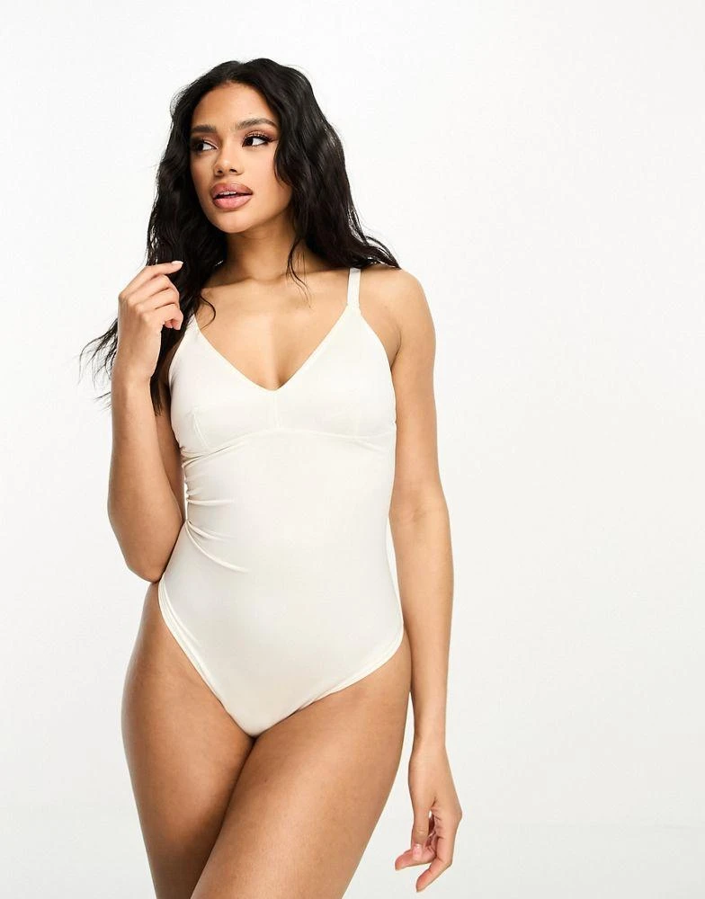 Spanx Spanx contouring Satin thong bodysuit in linen white - Tops - BeyondStyle