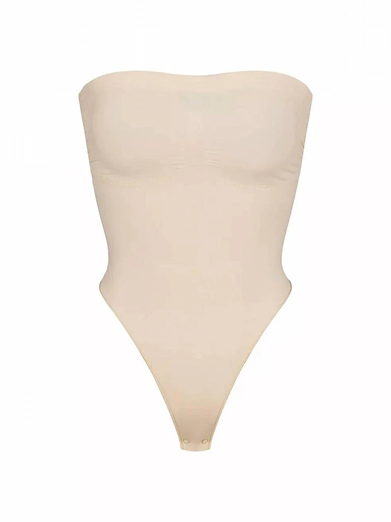 SKIMS Seamless Sculpt Strapless Thong Bodysuit In Clay - Tops - Free ...