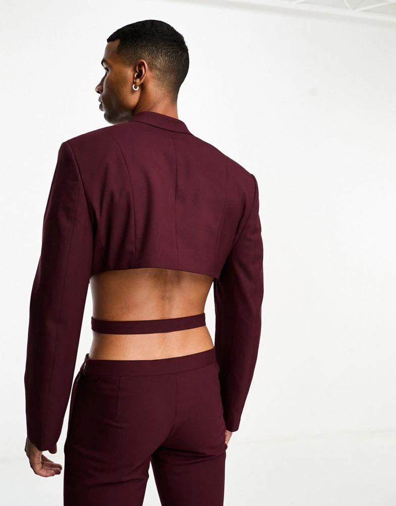 Shop ASOS DESIGN skinny v-hem supercrop belted suit jacket in burgundy ...